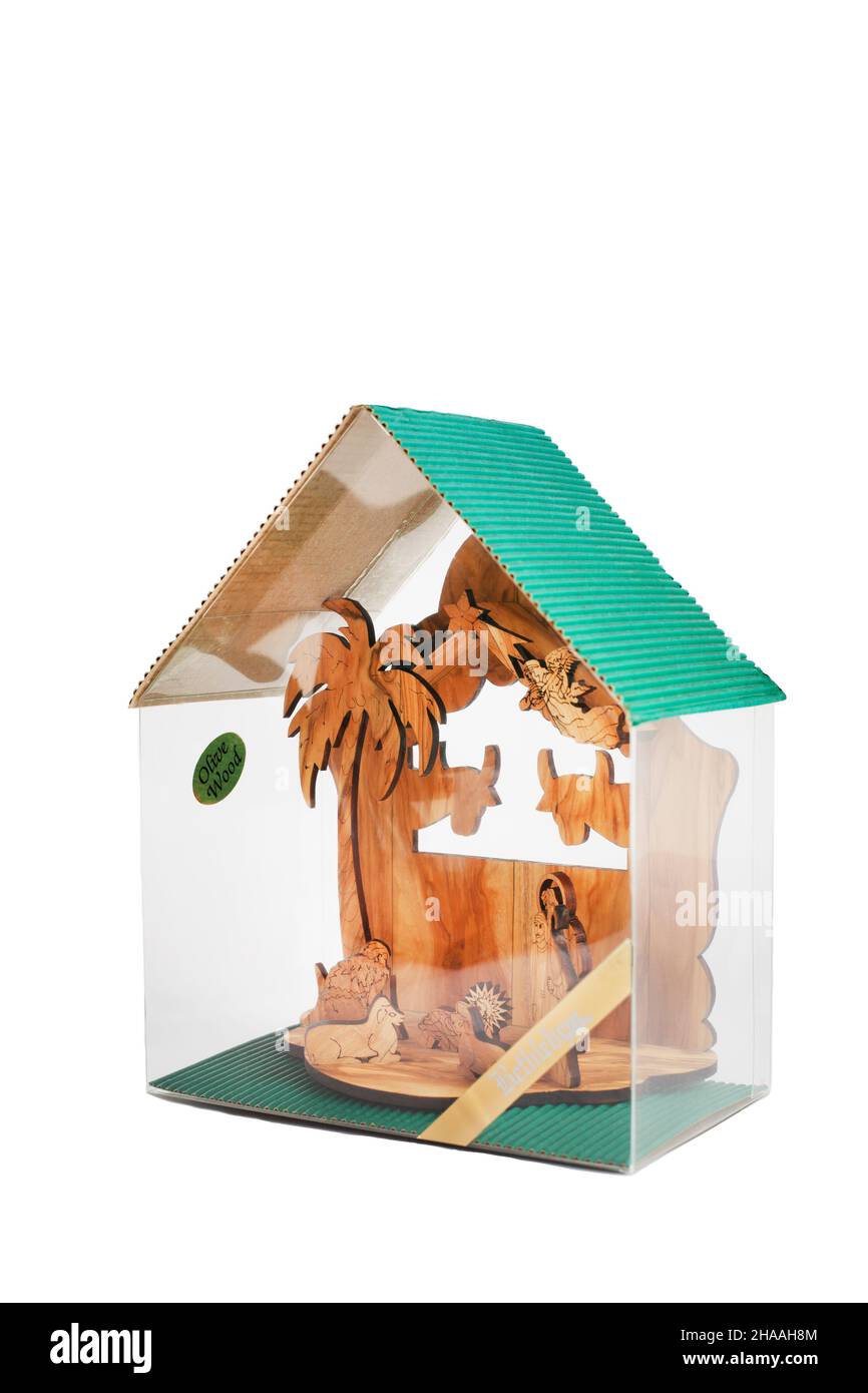 Carved wooden Nativity scene with Jesus in box isolated on white ...