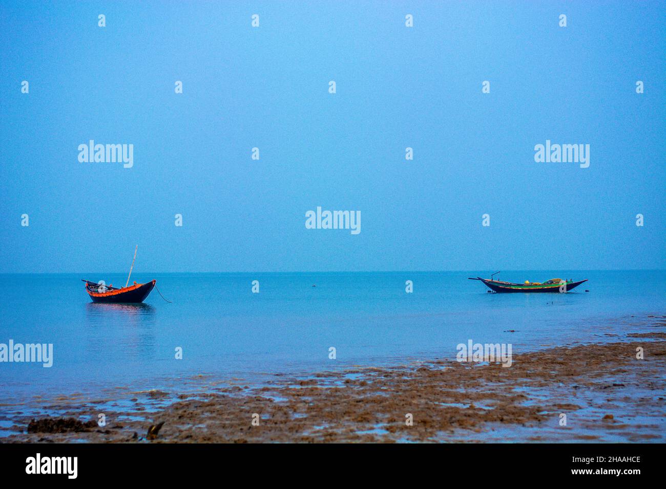 Indian native rustic wooden fishing boats in bay of Bengal to capture ...