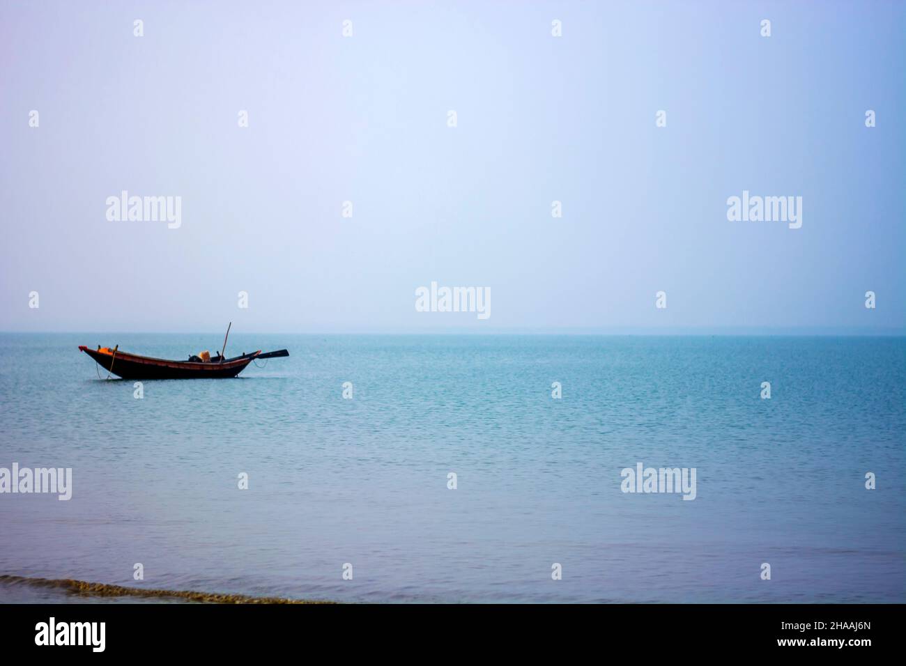 Indian native rustic wooden fishing boats in bay of Bengal to capture ...