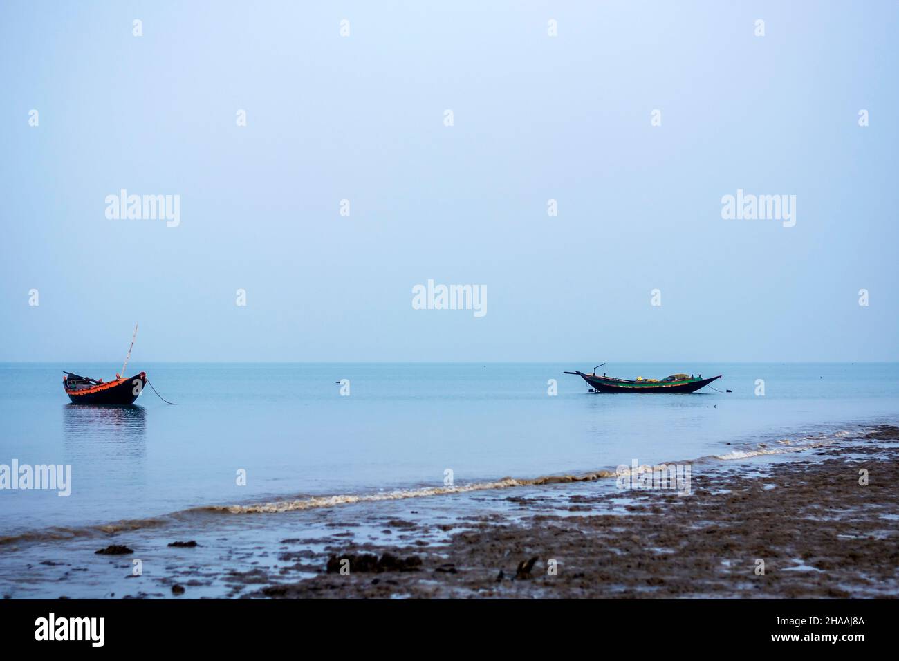 Indian native rustic wooden fishing boats in bay of Bengal to capture ...