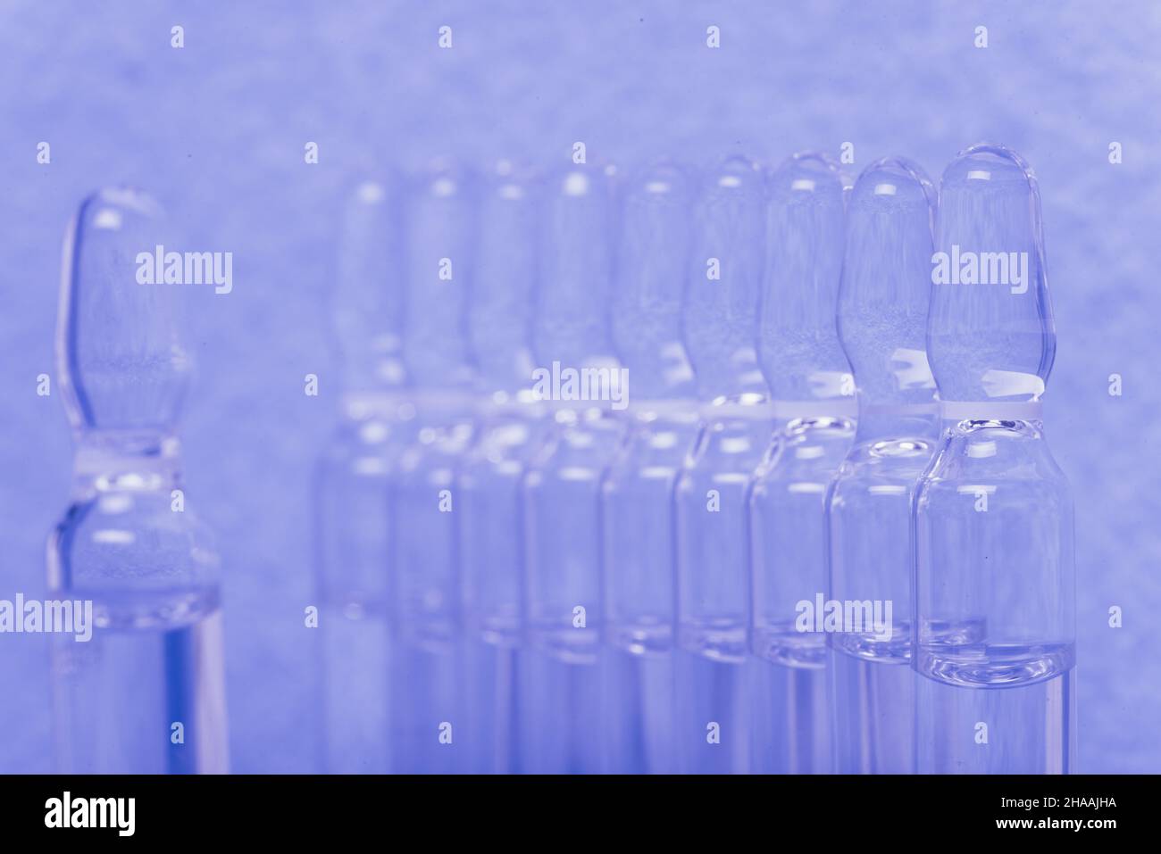 Glass medical ampoule vial for injection. Medicine is liquid sodium ...