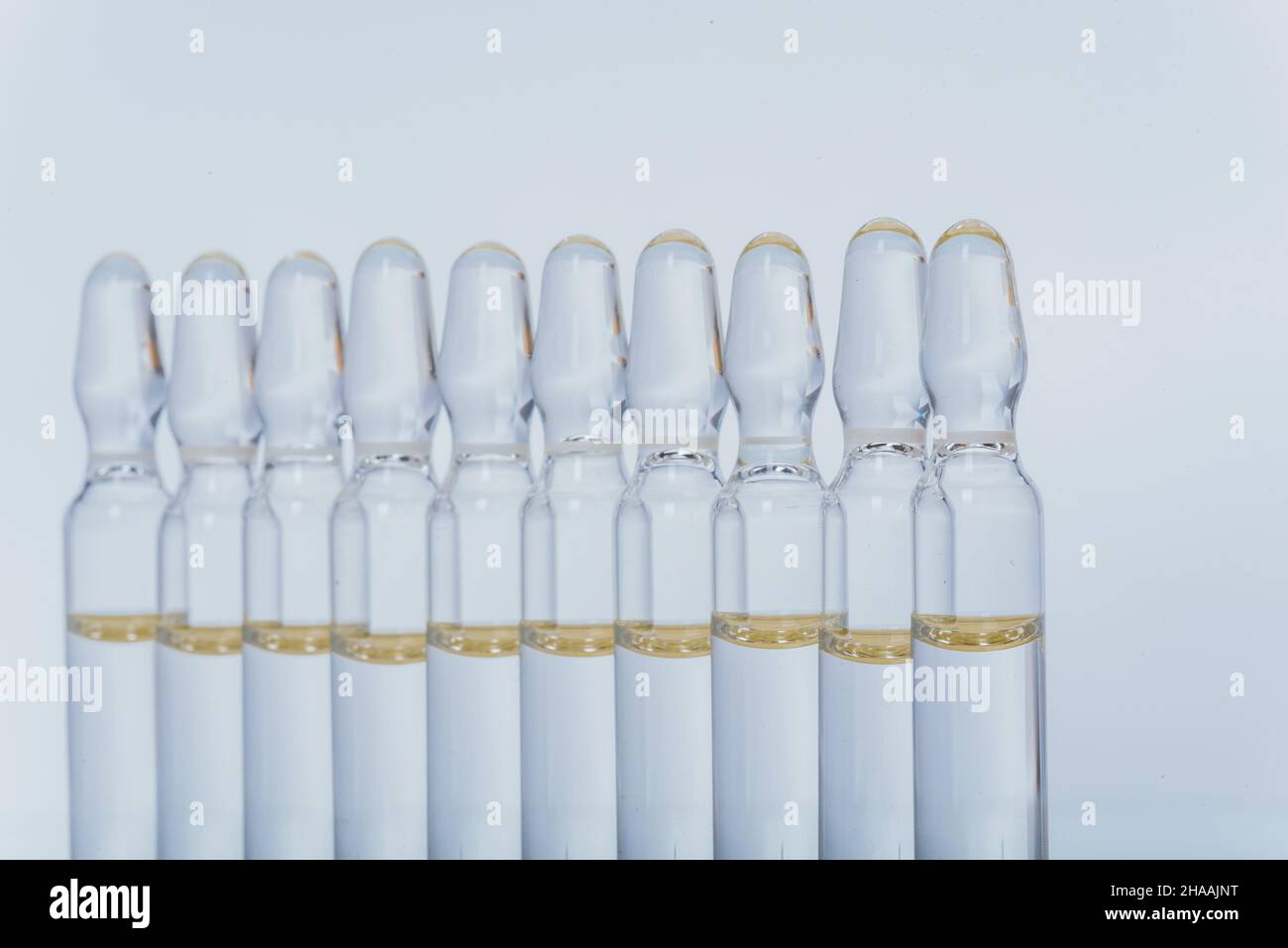 Glass medical ampoule vial for injection. Medicine is liquid sodium ...