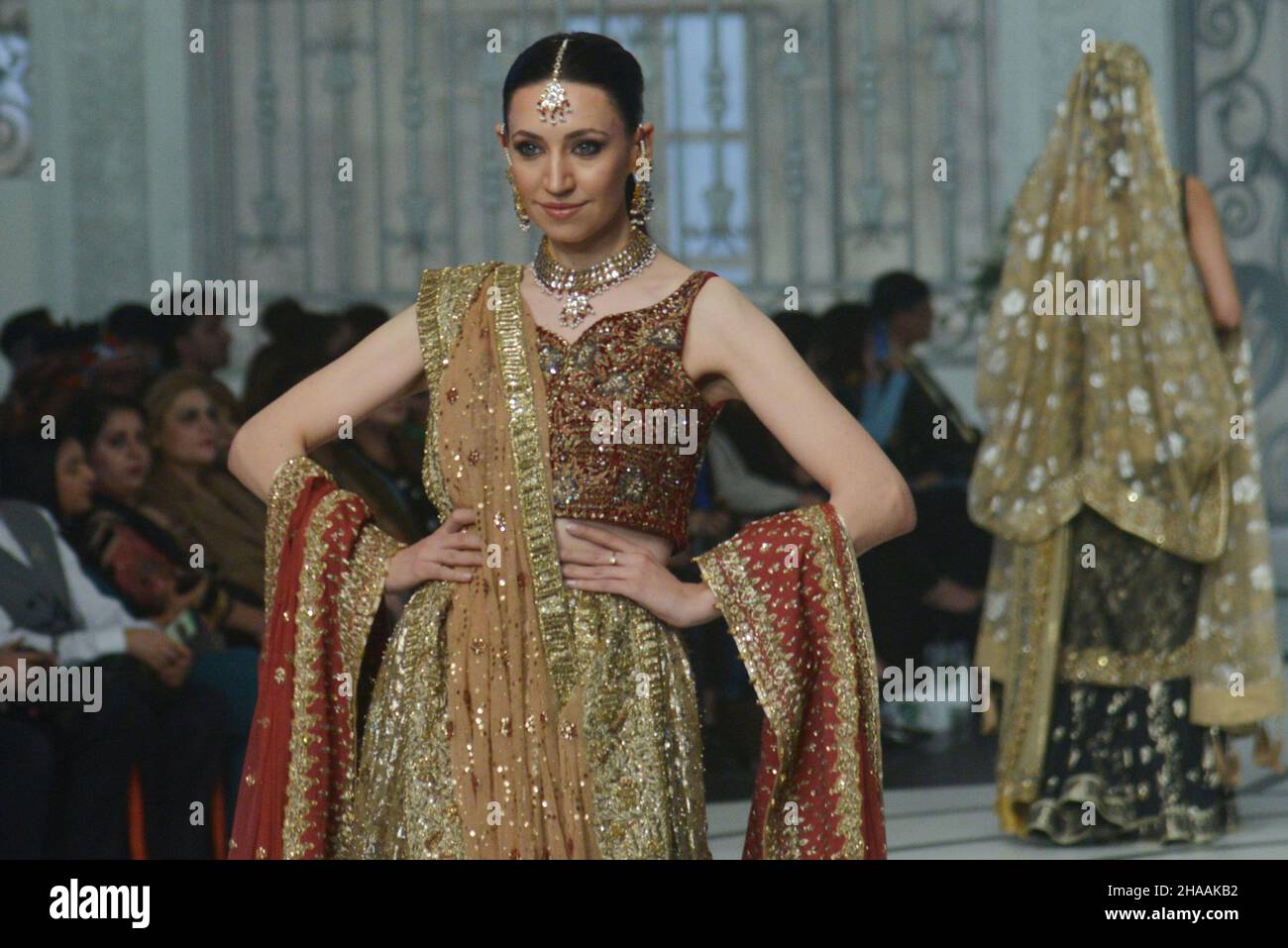 December 11, 2021, Lahore, Punjab, Pakistan: Pakistani model presents a ...