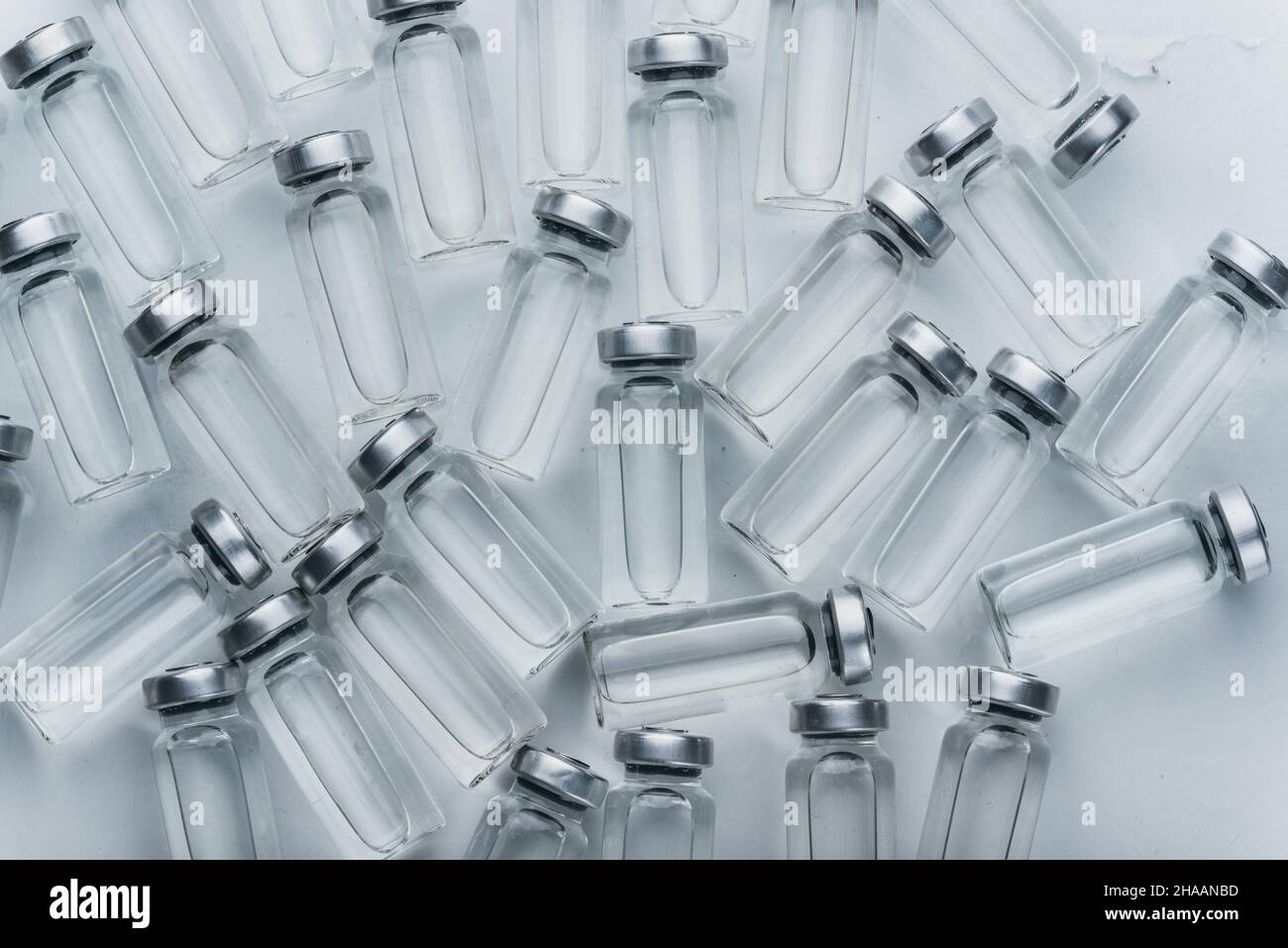Glass medical ampoule vial for injection. Medicine is dry white drug ...