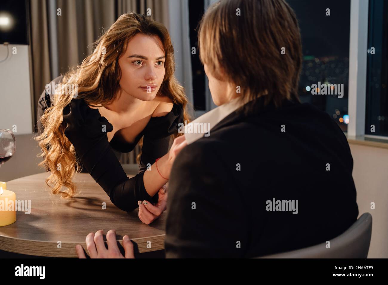 Young couple kissing in love, fashion woman man romantic longing desire ...