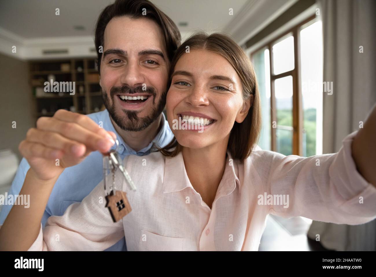 Happy couple of homeowners beginning living together Stock Photo - Alamy