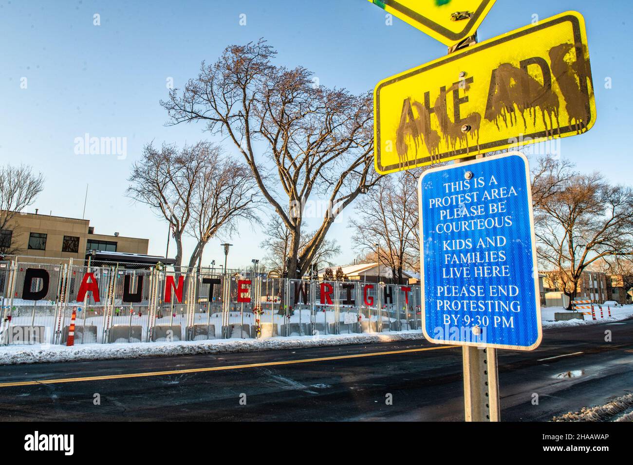 A sign declaring the area a protest area and to end protesting by 9:30 ...