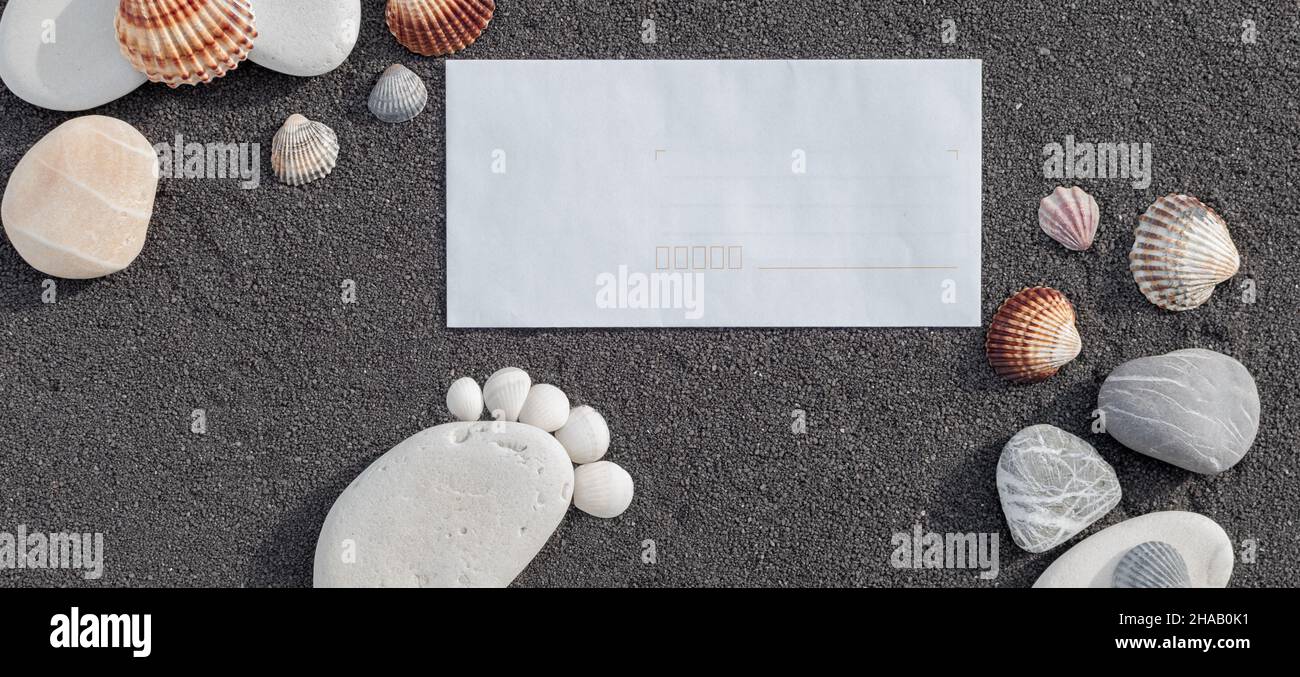 Background grains of sea sand, beach sand with envelope and pebble ...