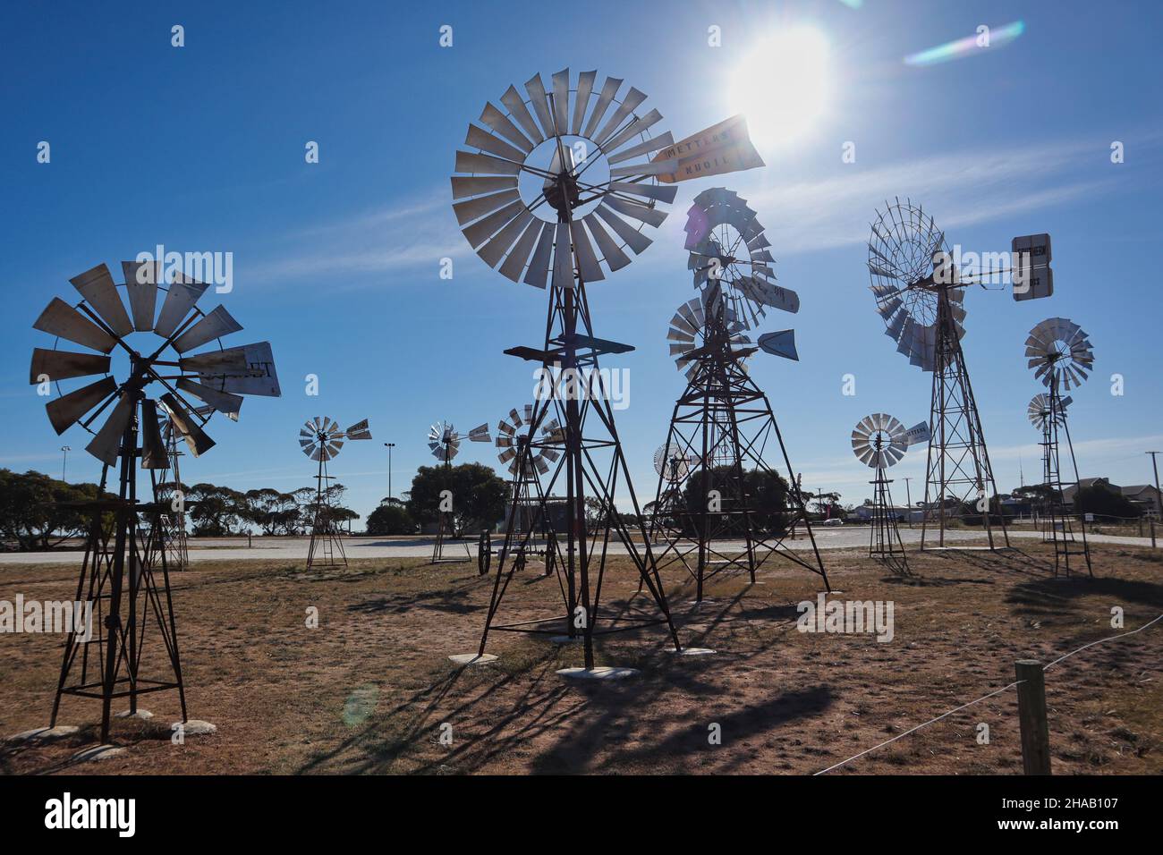 a collection of windmills and Penong windmill museum Stock Photo - Alamy