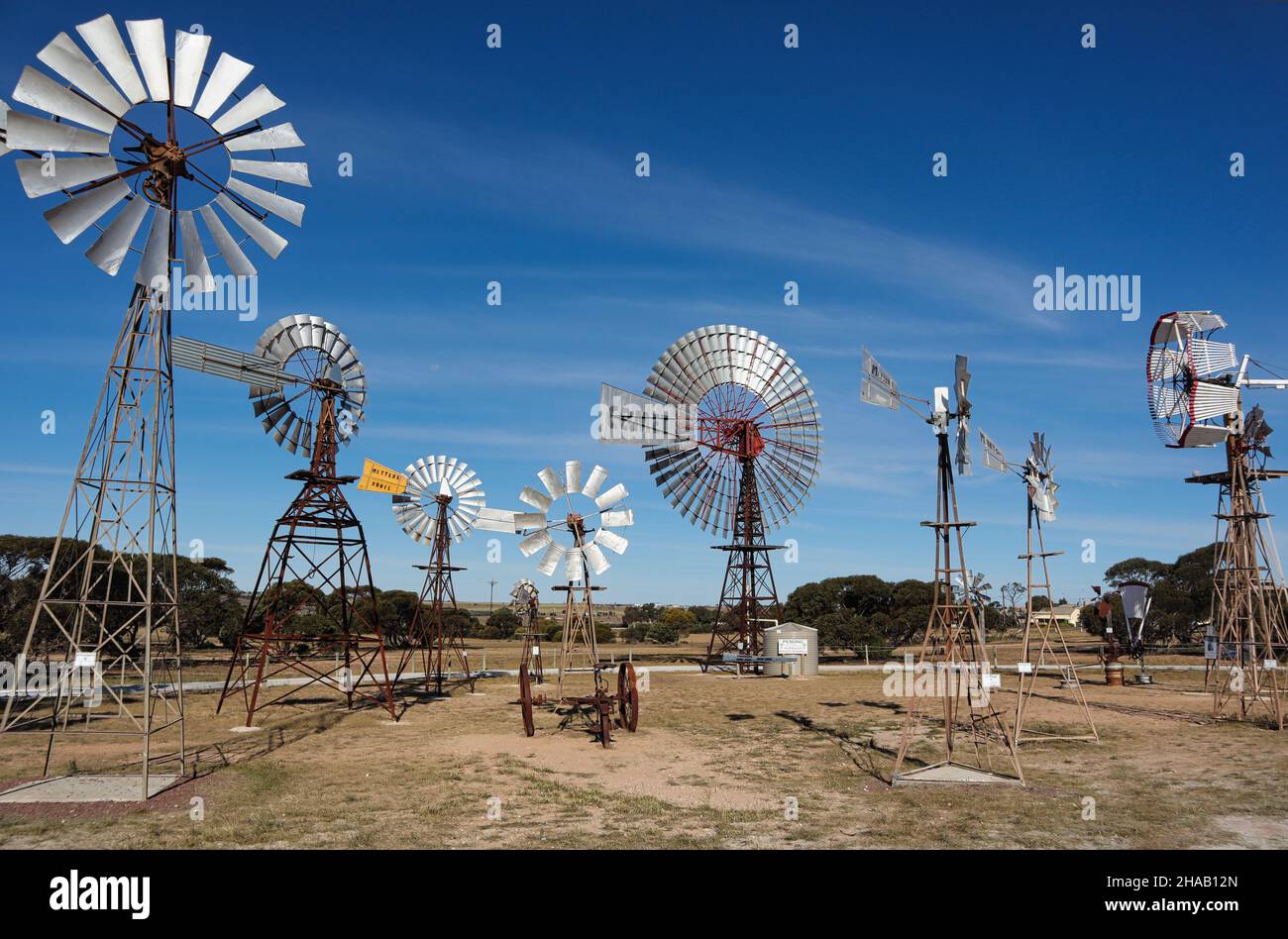 a collection of windmills and Penong windmill museum Stock Photo - Alamy