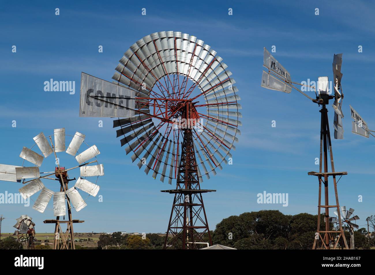 a collection of windmills and Penong windmill museum Stock Photo - Alamy