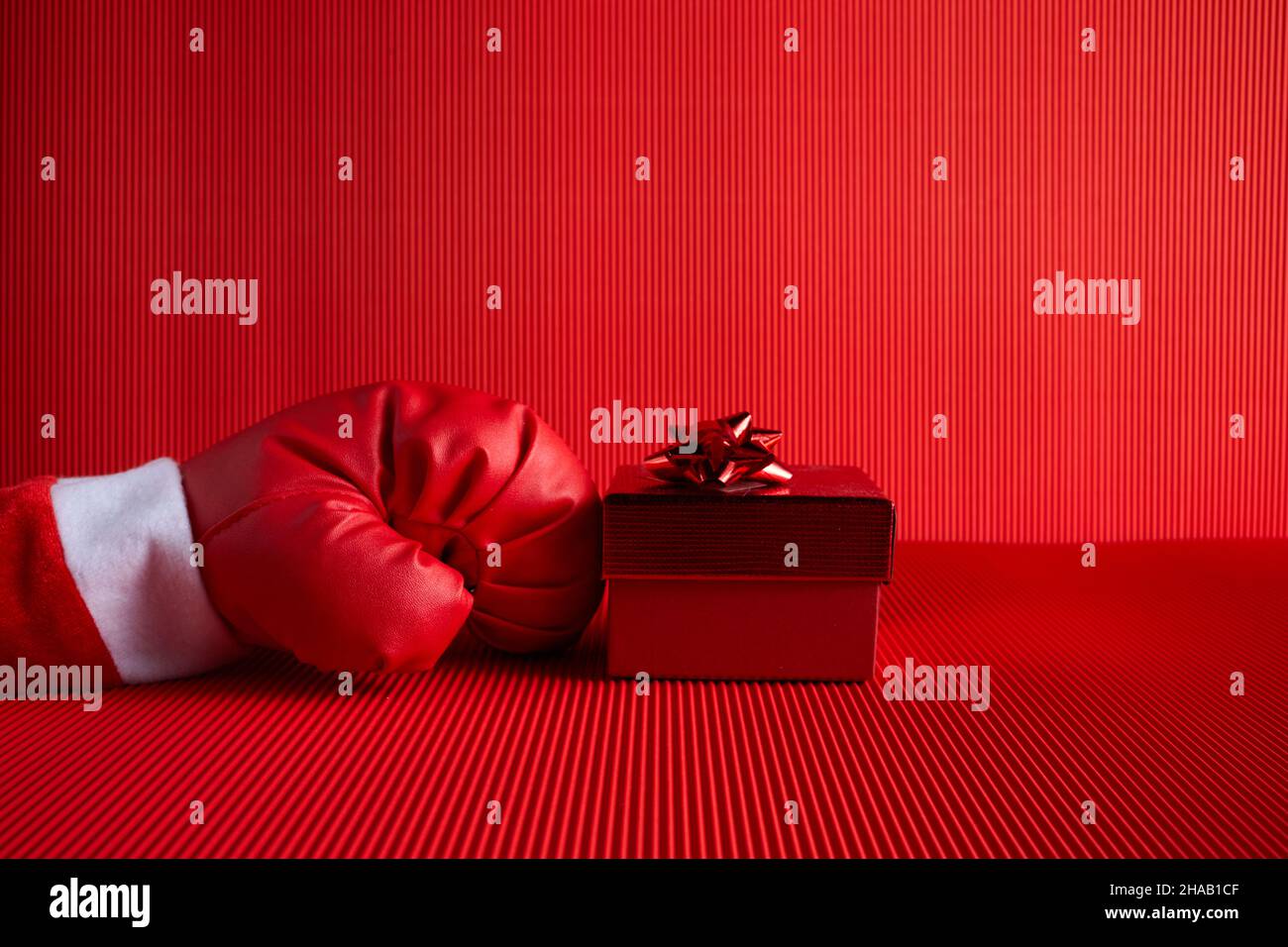 Boxing day shopping creative idea. Boxing glove with gift box Stock ...
