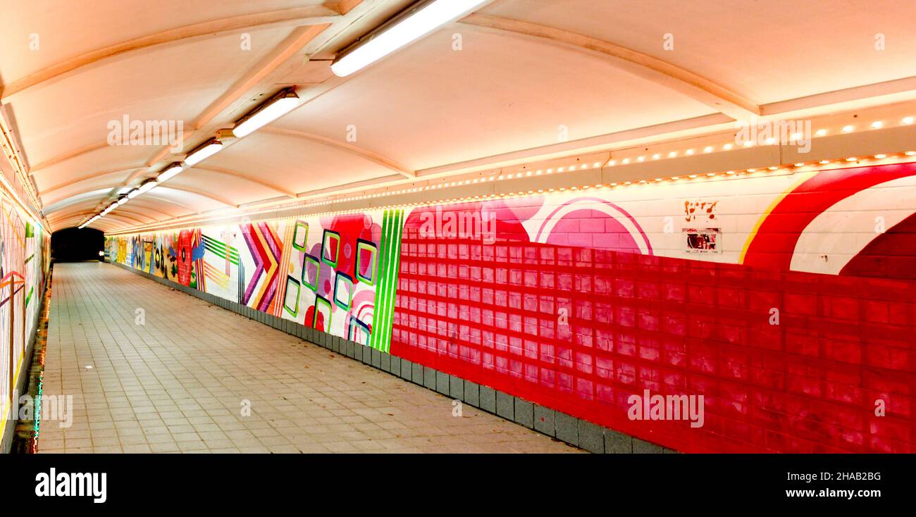 A beautiful colorful art on the wall of a public tunnel Stock Photo - Alamy