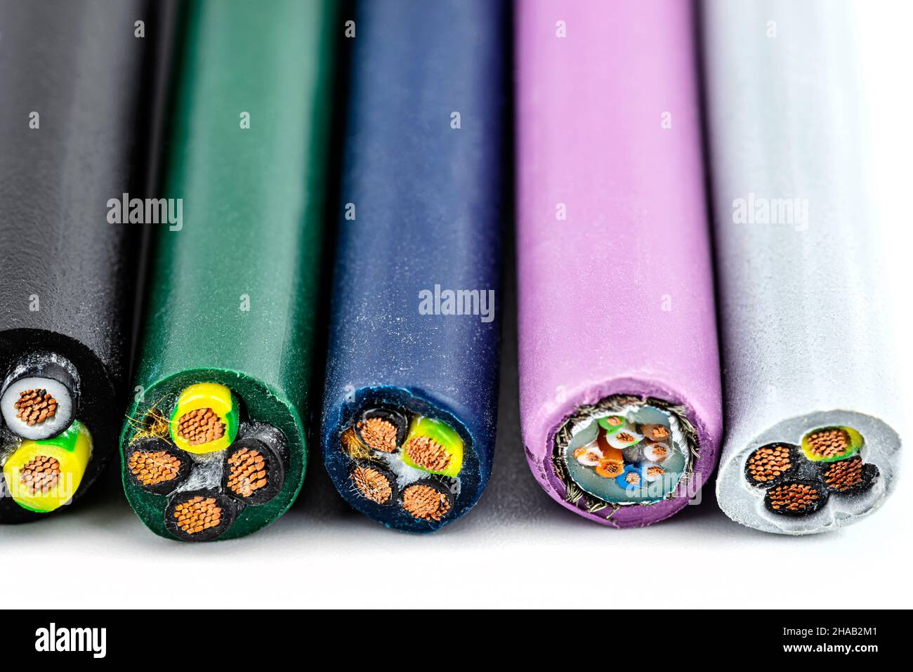Macro photo of the cross section of various electric cables, isolated ...