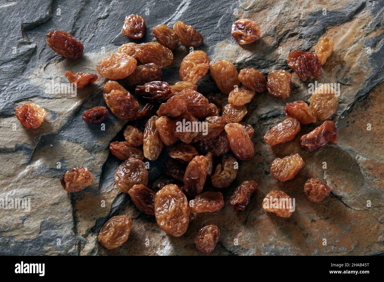 raisins from above on stone surface Stock Photo - Alamy