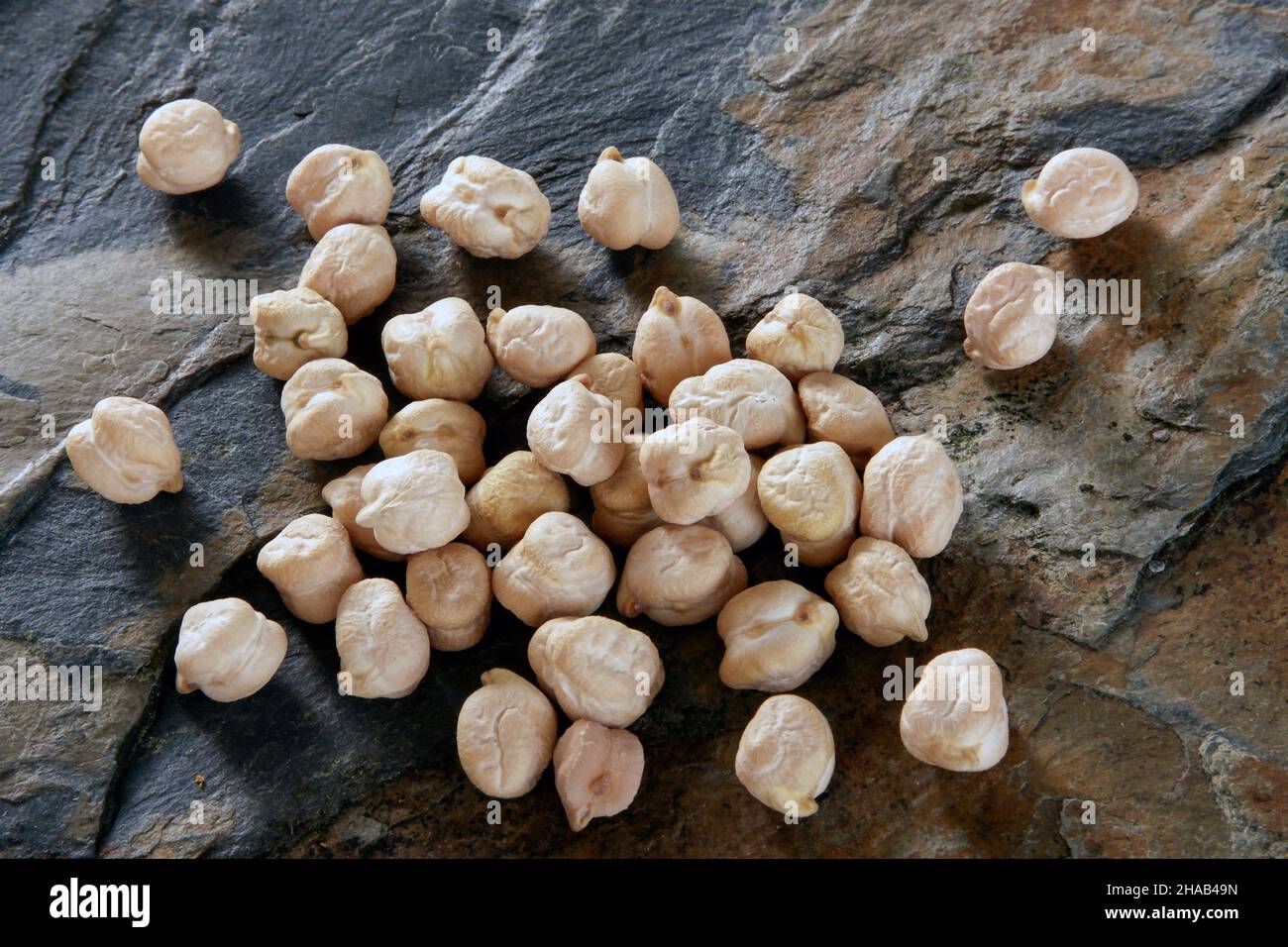 chickpeas from above on stone surface Stock Photo - Alamy