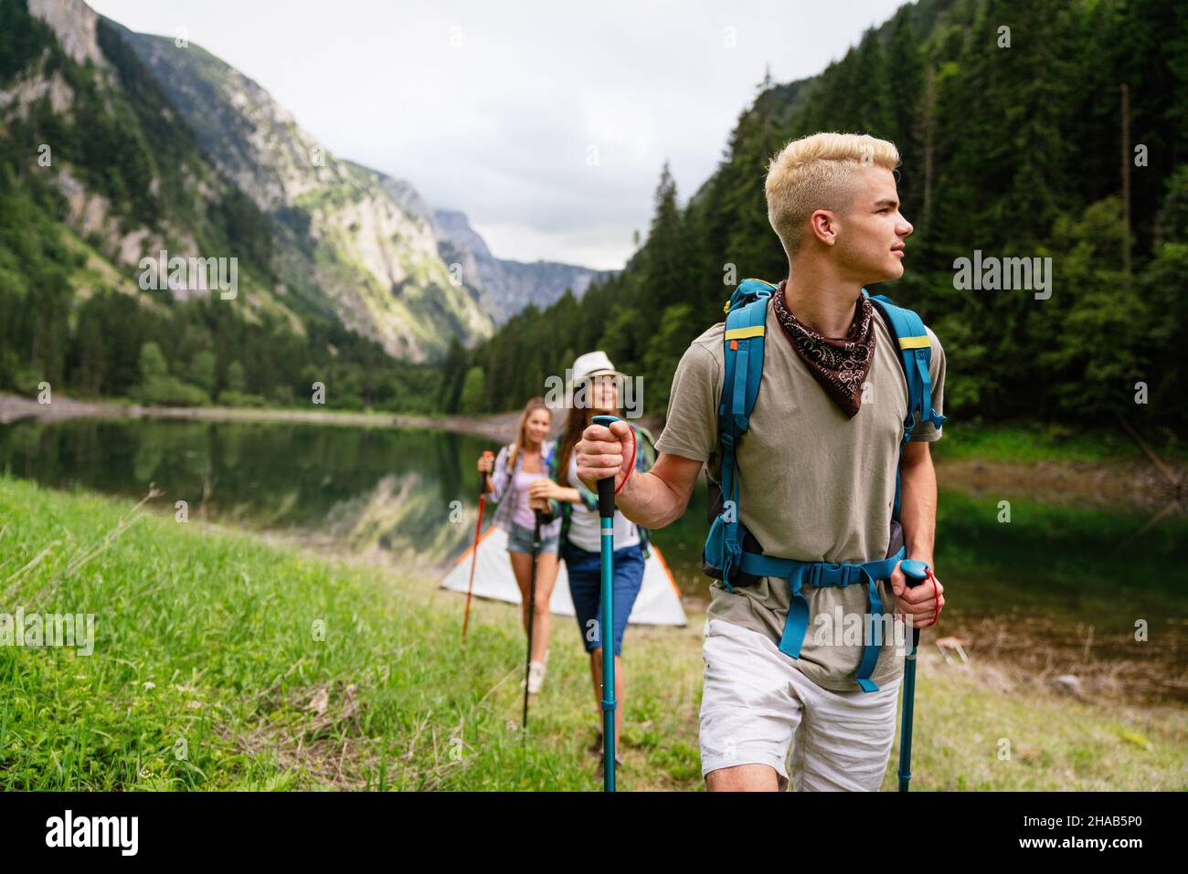 Group of happy friends enjoying outdoor activity together Stock Photo ...