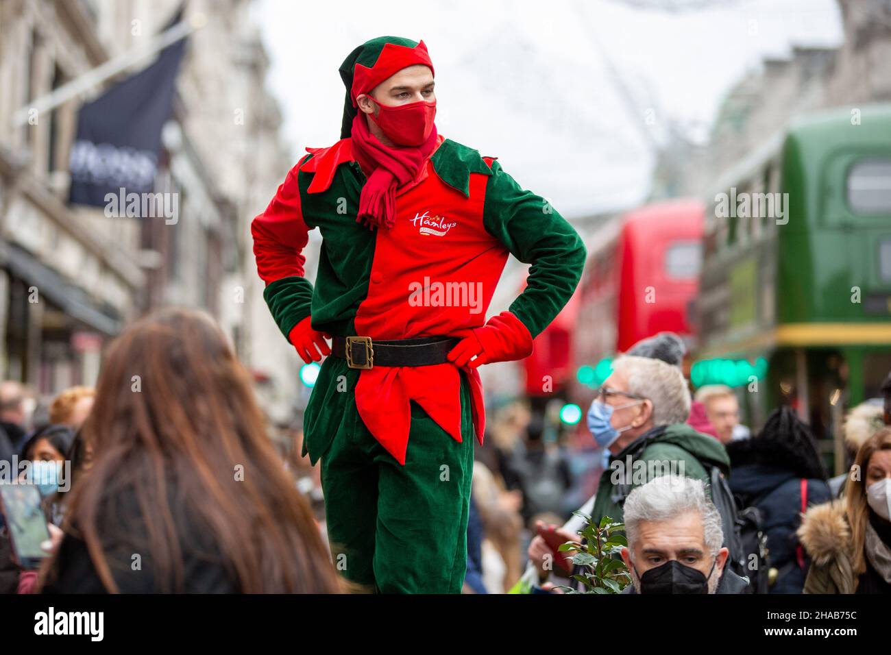 Hamleys staff dressed as Elf entertains people outside the Toy Store in ...
