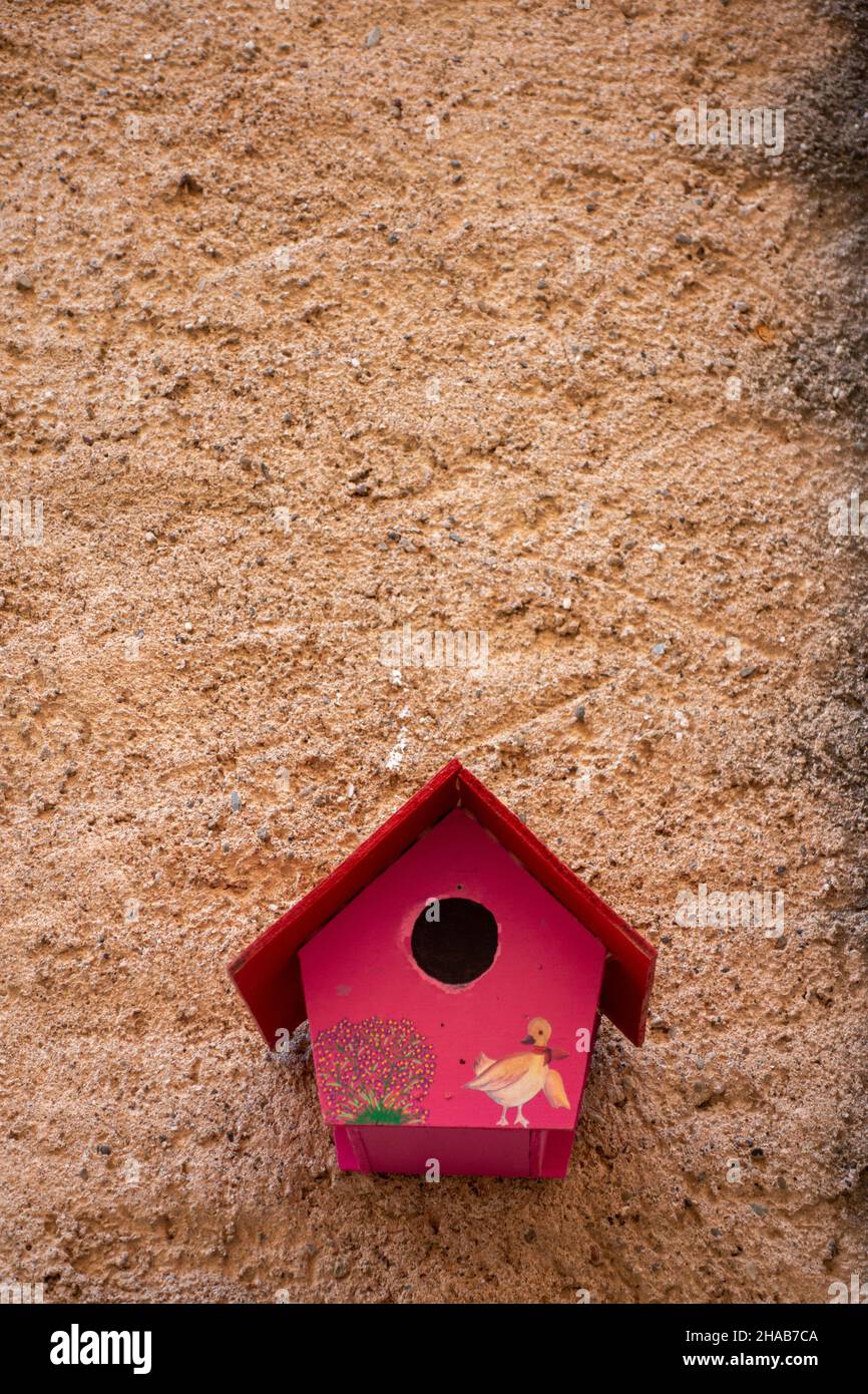 Red bird box in Cessenon Sur Orb, France Stock Photo - Alamy
