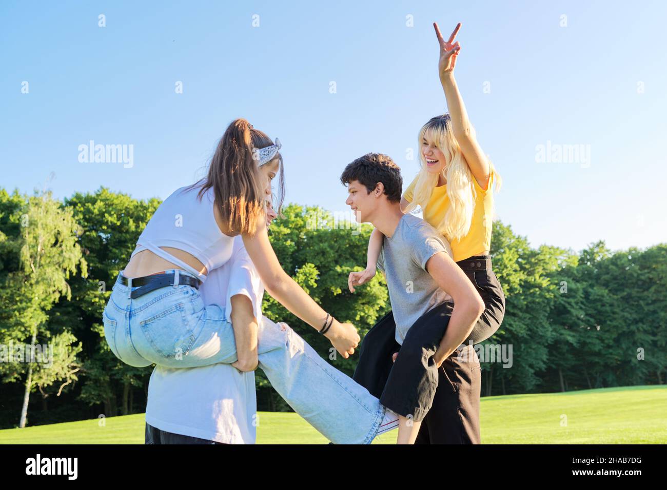 Teenage youth having fun in the park, happy laughing friends Stock ...