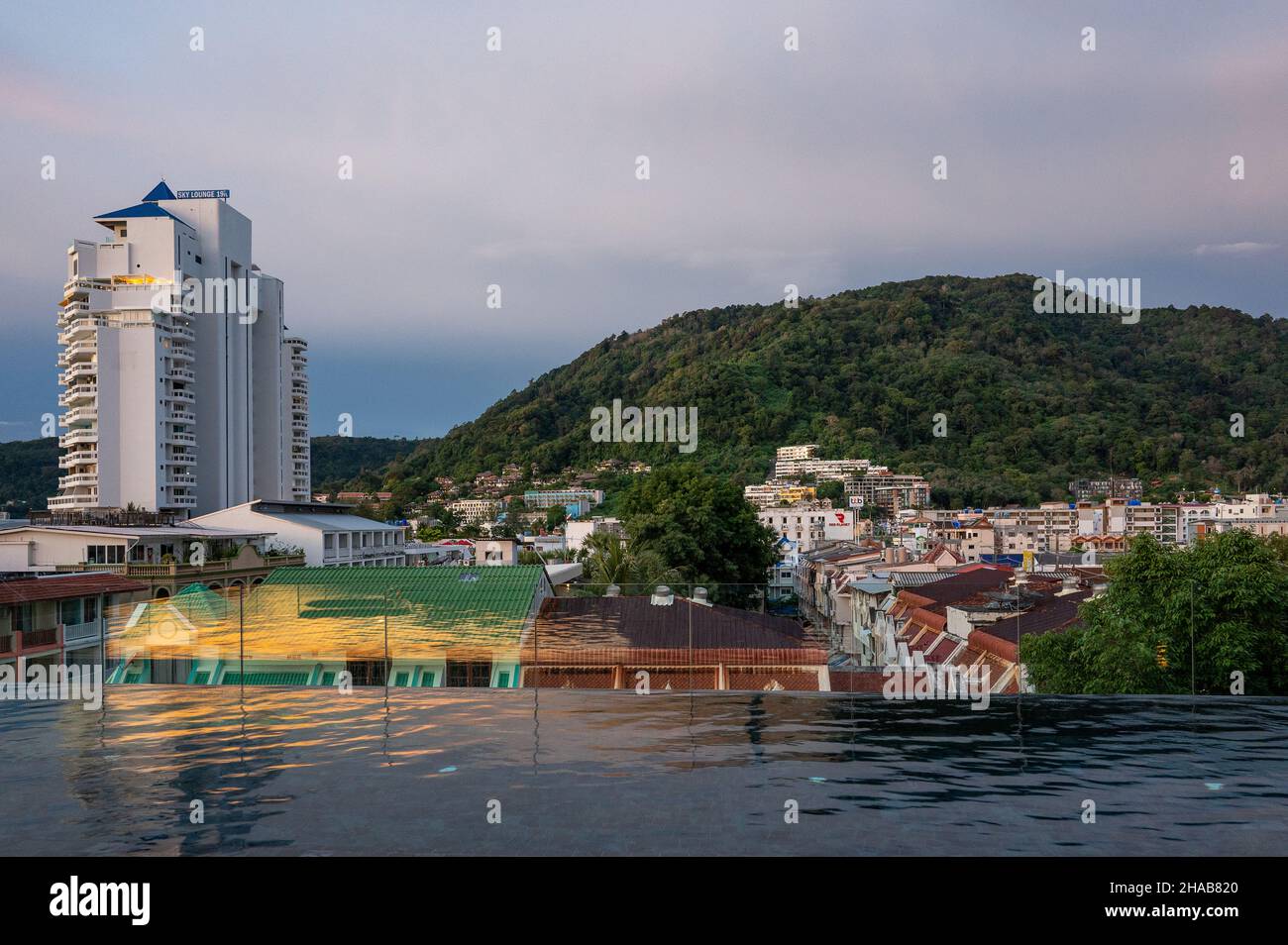 Rooftop bar and pool before sunset at Patong in Phuket. Patong is one ...