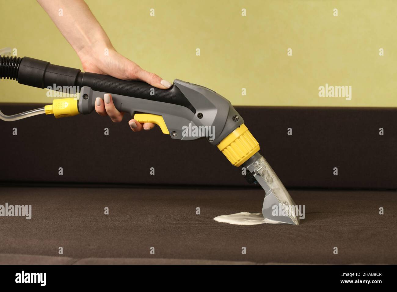 Deep professional cleaning of sofa with vaccum cleaner Stock Photo - Alamy