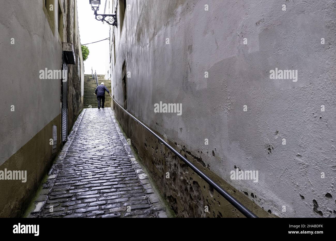 Wet stone street in old town, construction and architecture Stock Photo ...
