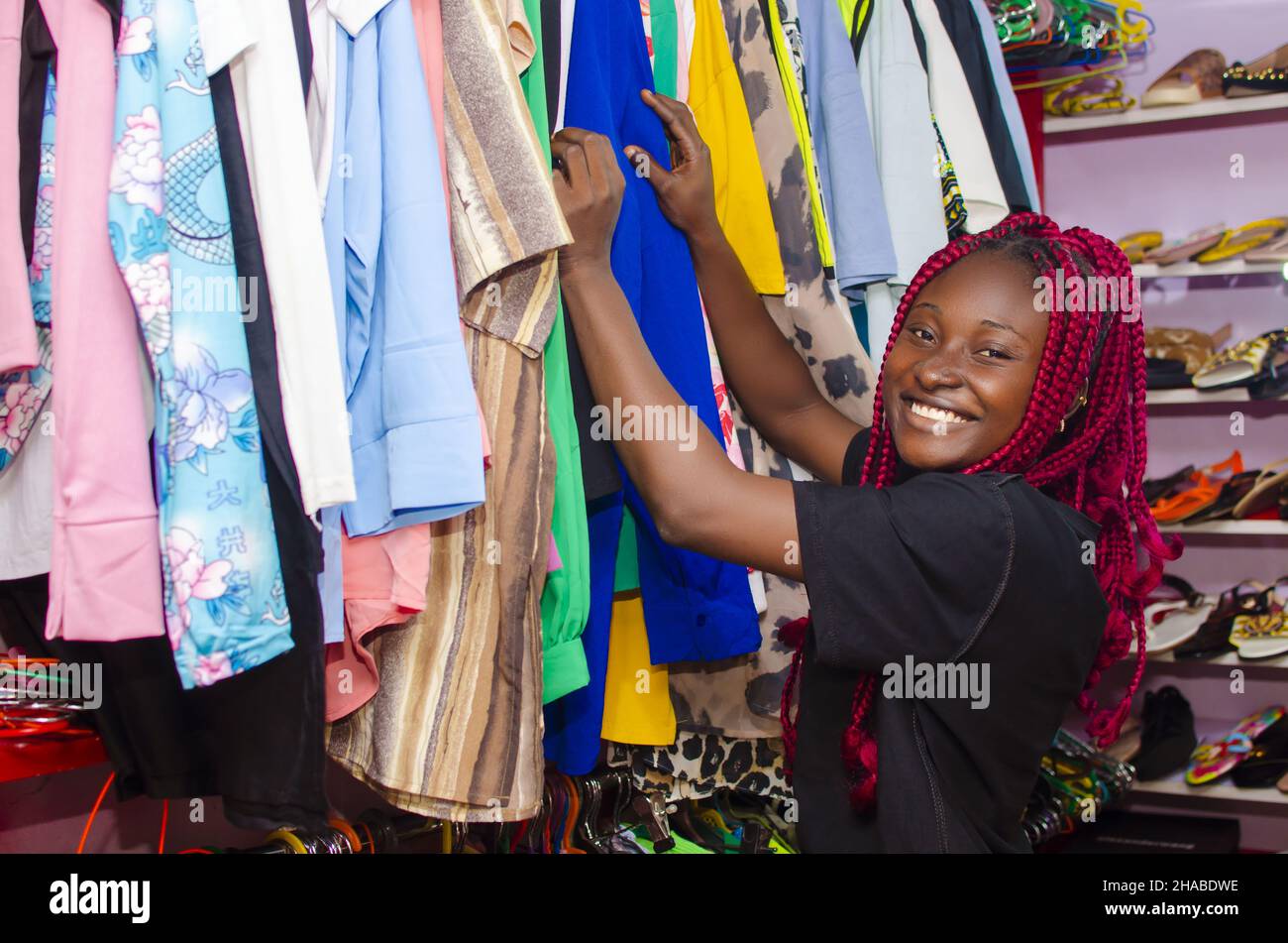 A black beautiful Nigerian girl with rasta red hair explore Batik ...
