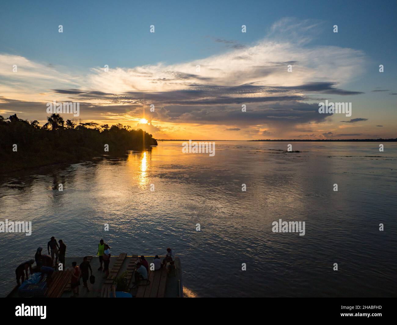 Magic sunset with beautiful clouds over the Amazon river. Amazonia ...