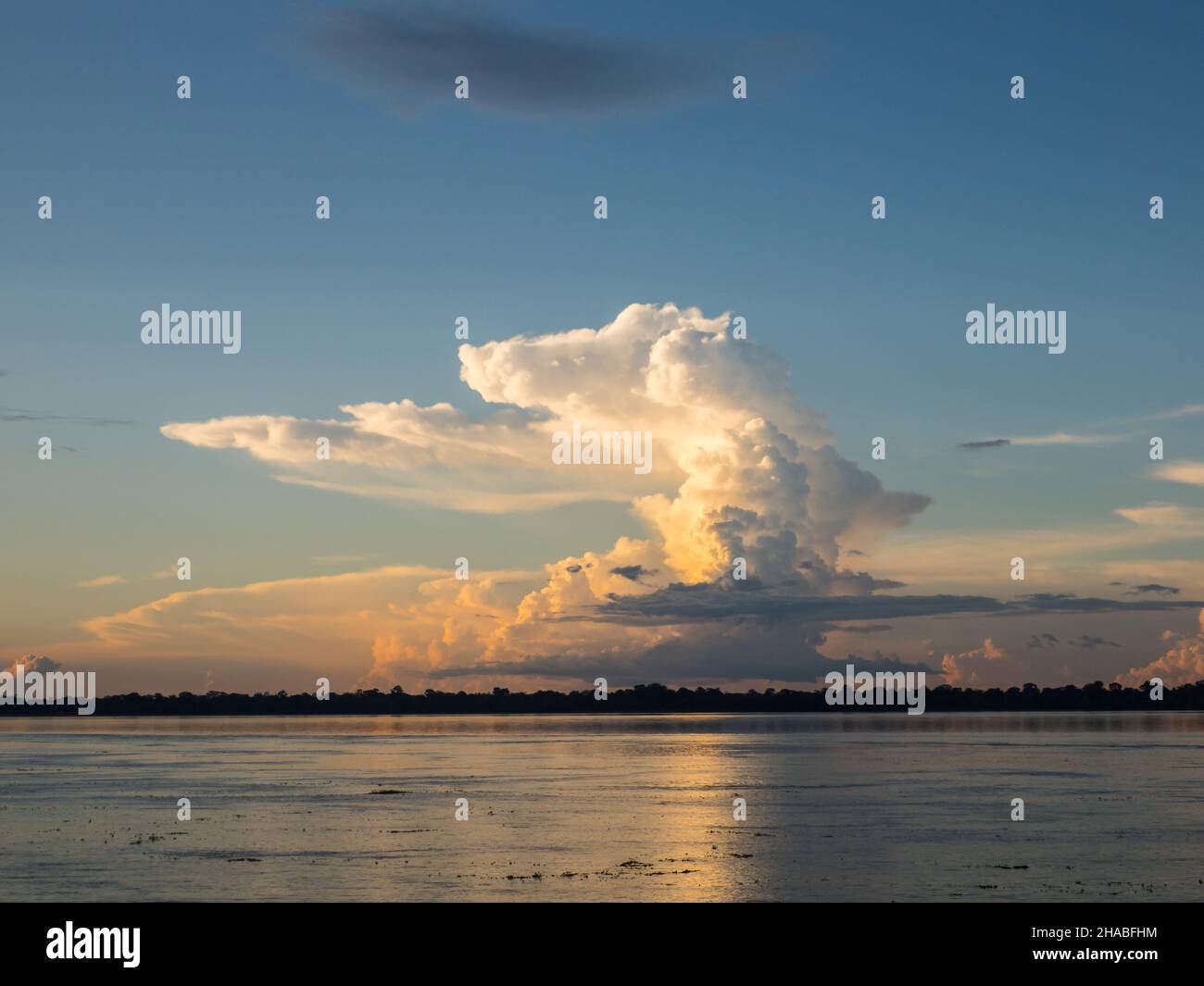 Magic sunset with beautiful clouds over the Amazon river. Amazonia ...