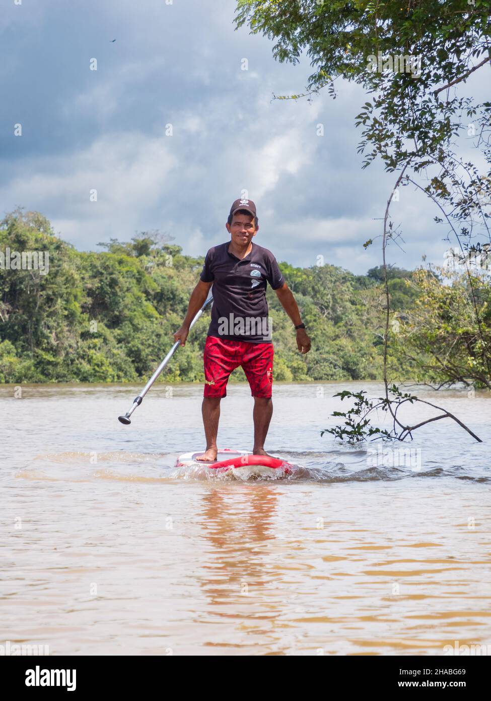 Laguna Onza, Brazil - Dec 2019: Portrait of a man floating on water on ...