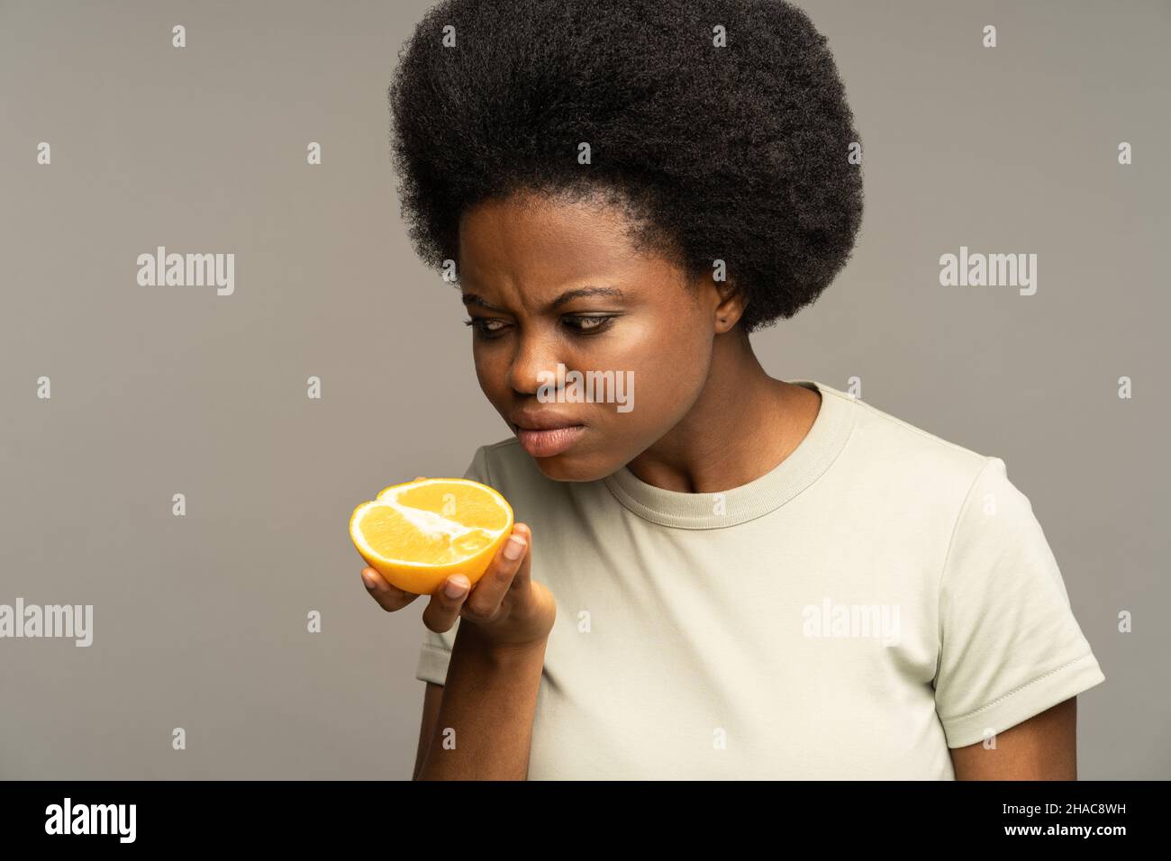 Young woman with orange suffer from covid-19 coronavirus disease ...