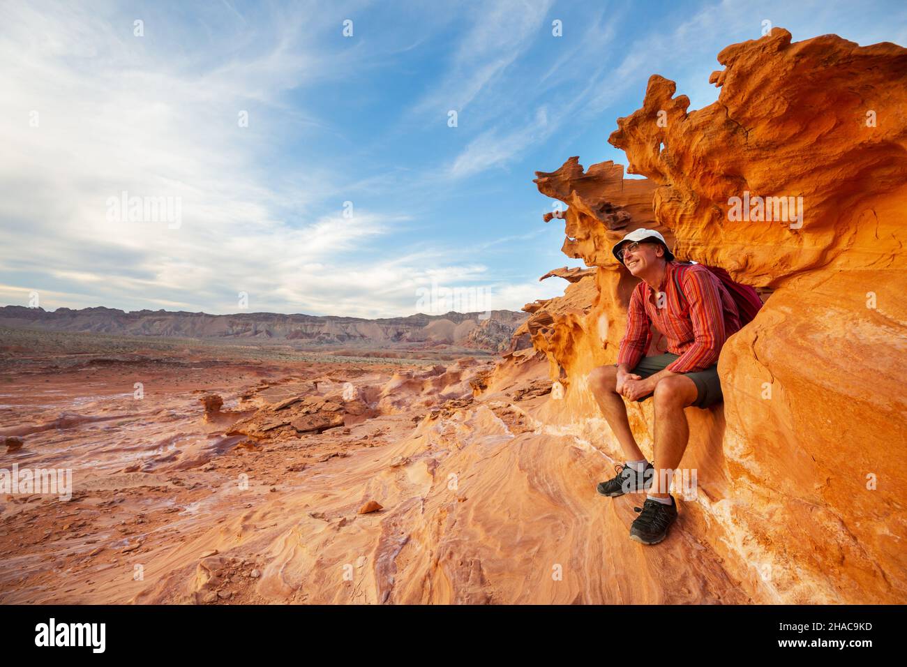 Hiker inside a stone arch in the Nevada desert near Las Vegas, Nevada ...