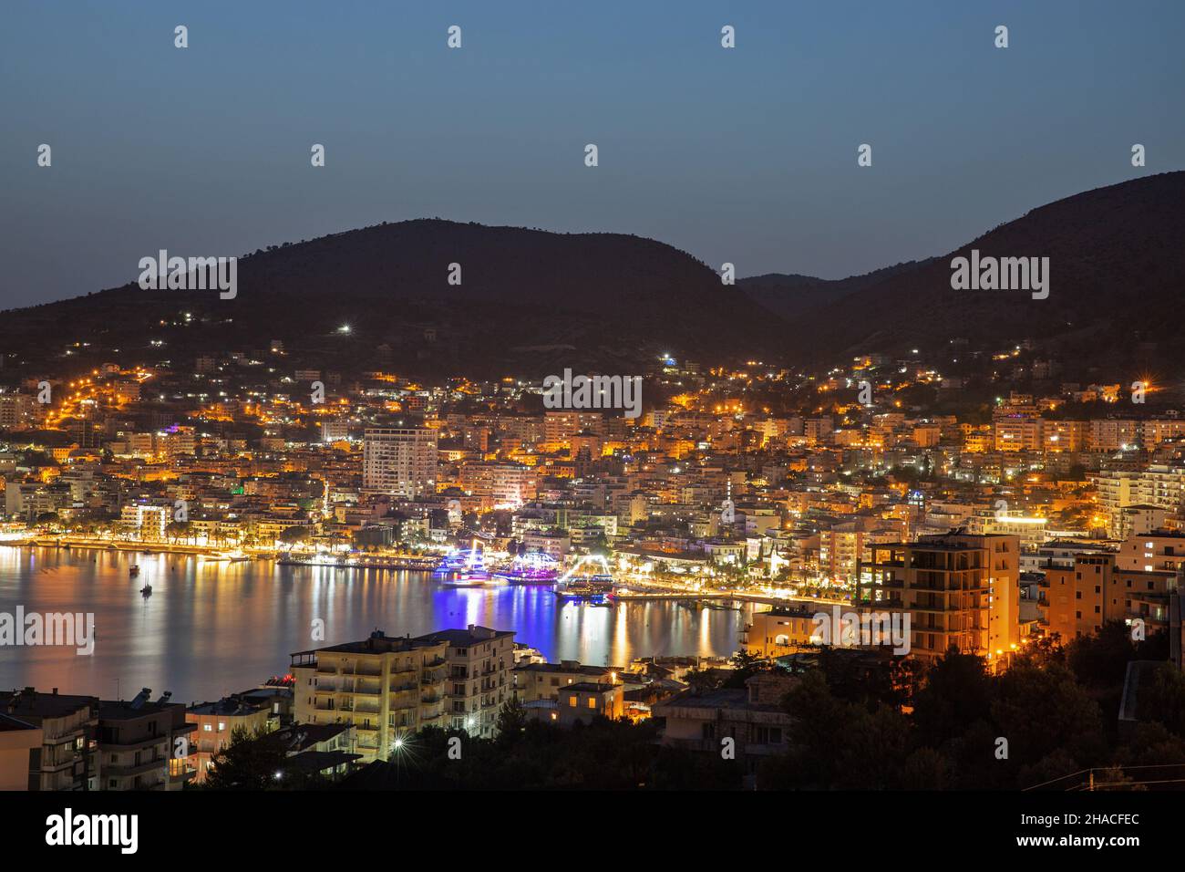 Beautiful sunset view of the night bay of Saranda, Albania Stock Photo ...