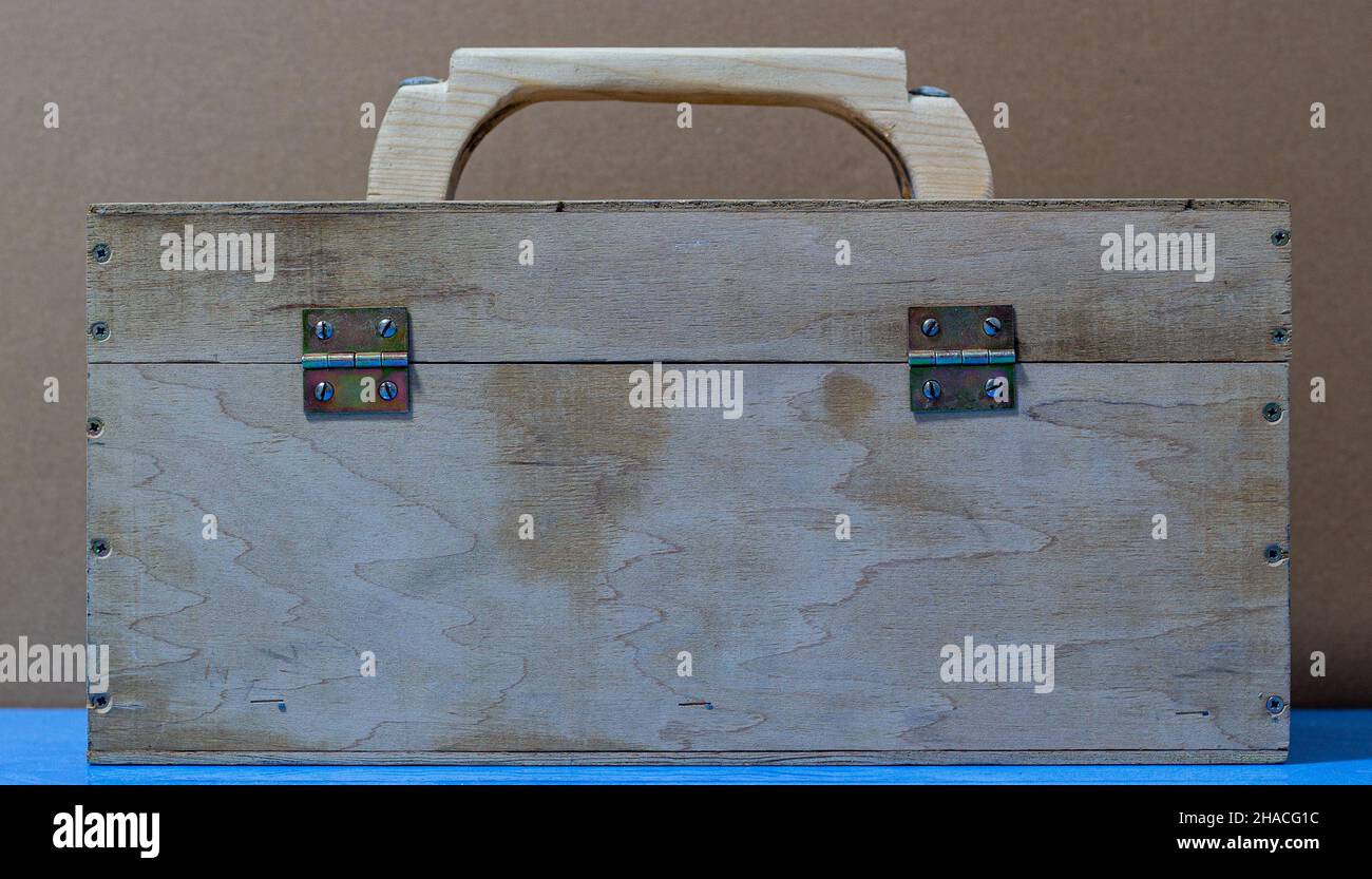 A closed wooden tool chest Stock Photo - Alamy