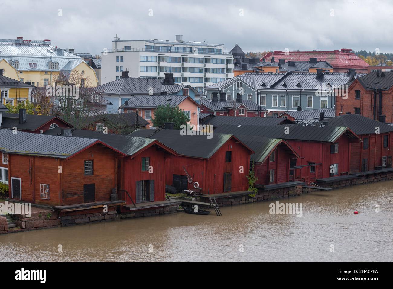 Old wooden barns are the symbol of Porvoo in the cityscape on a gloomy ...