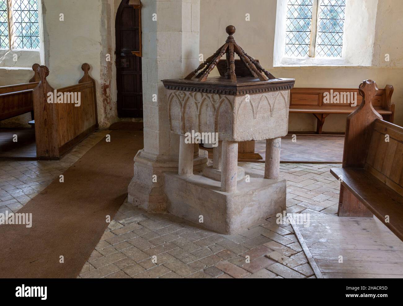 Thirteenth century Norman baptismal font, Lindsey church, Suffolk ...