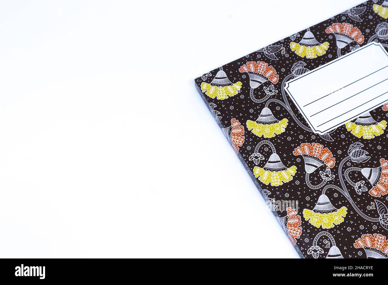 A Patterned Book in The Side of Minimalist White Background with ...