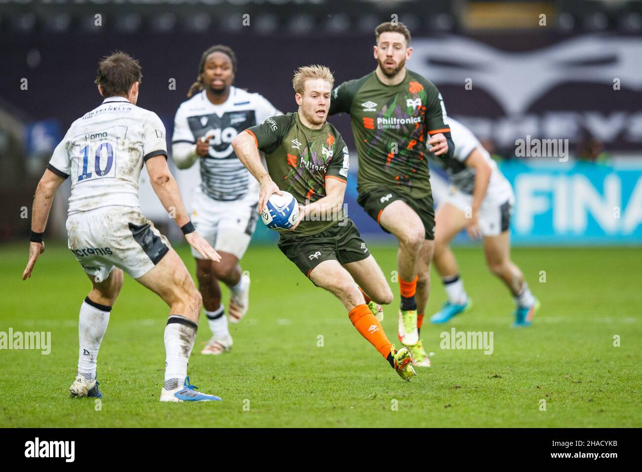 Swansea, UK. 12th Dec, 2021. Ospreys fullback Mat Protheroe breaks out ...