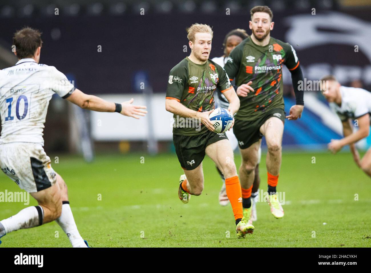 Swansea, UK. 12th Dec, 2021. Ospreys fullback Mat Protheroe breaks out ...