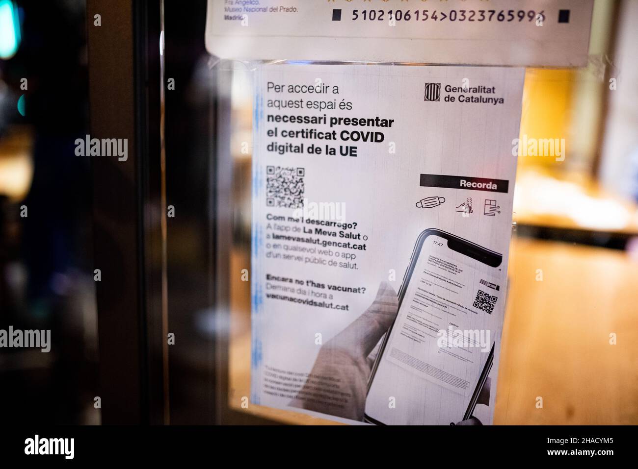 Spain. 11th Dec, 2021. A sign requiring the Covid vaccination ...