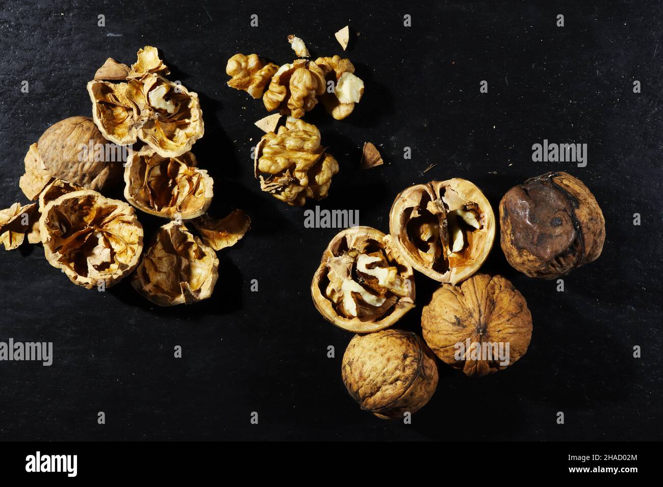 Photography of whole and broken walnuts on slate background for food ...