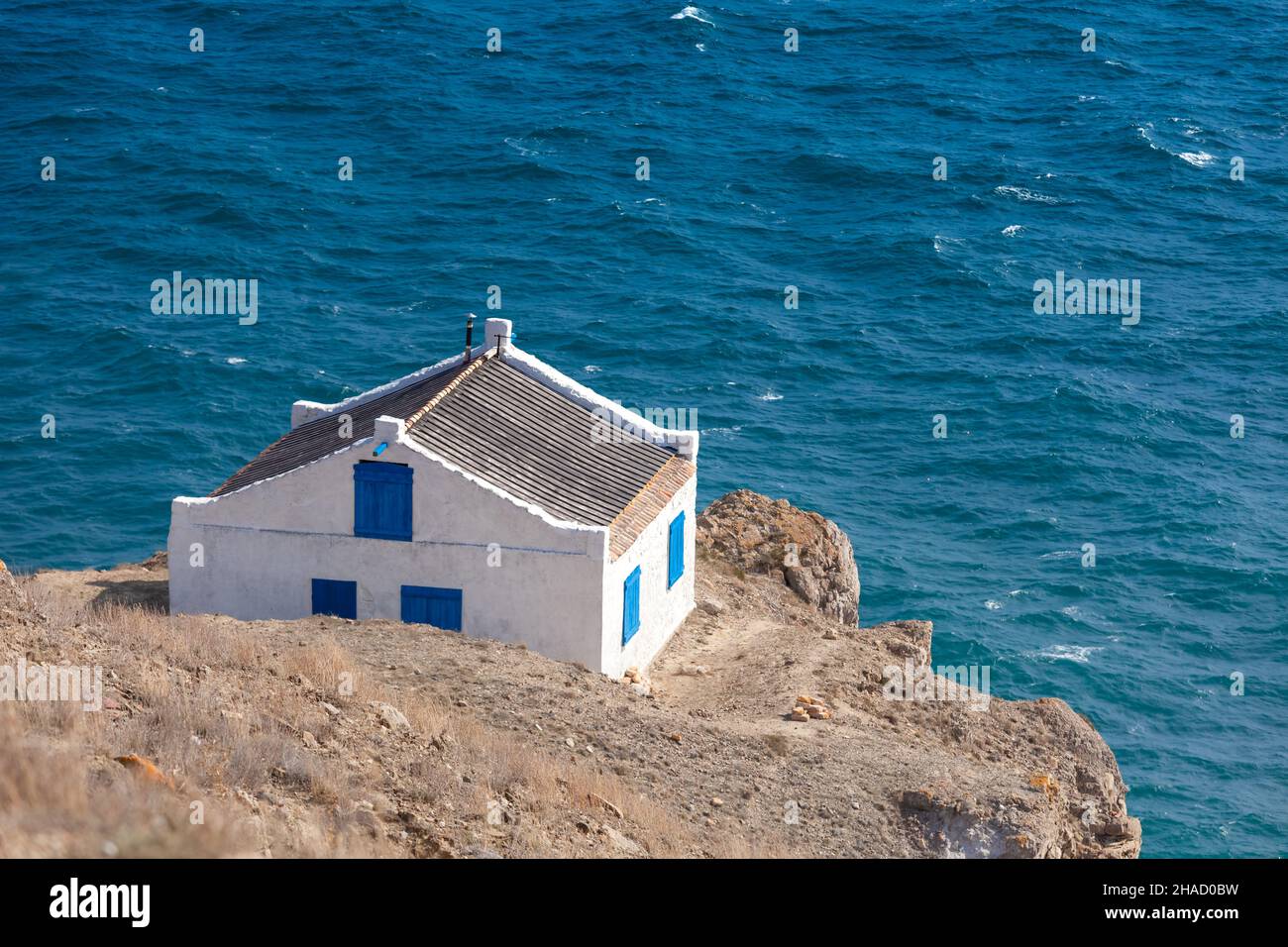 House on the edge of a cliff overlooking the sea Stock Photo - Alamy