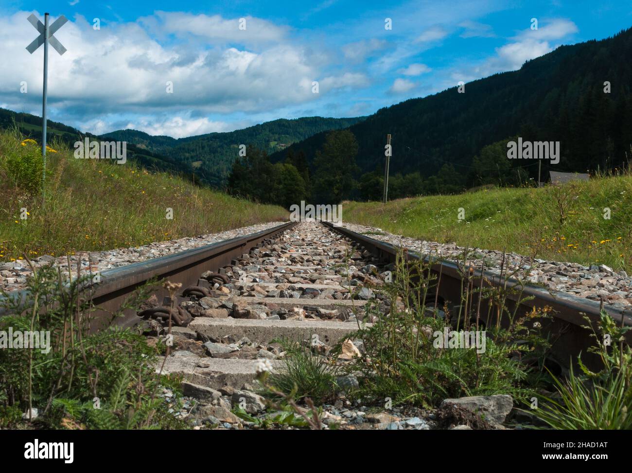 The way to somewhere. Perspective view of train tracks that appear to ...