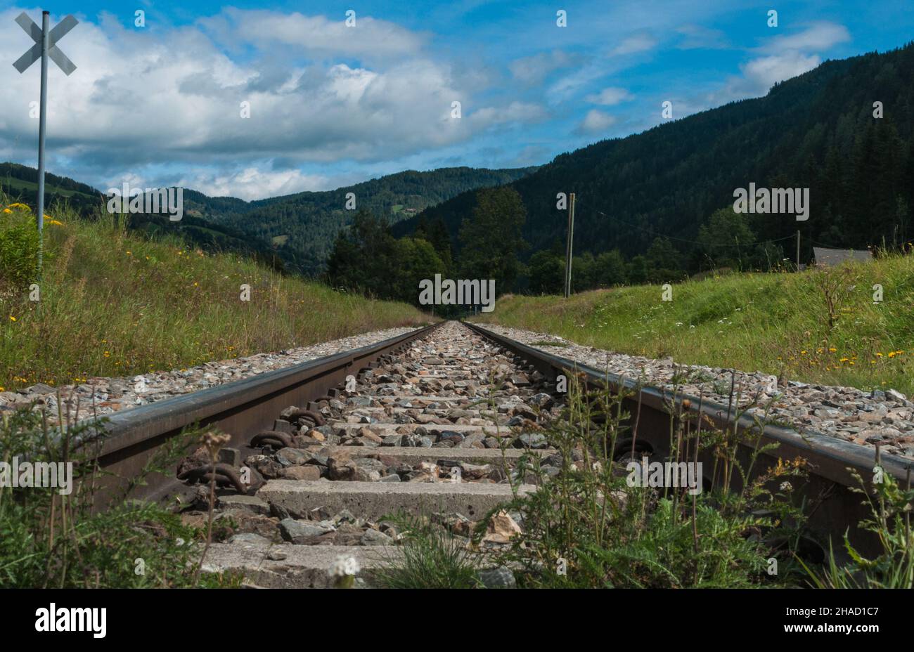 The way to somewhere. Perspective view of train tracks that appear to ...