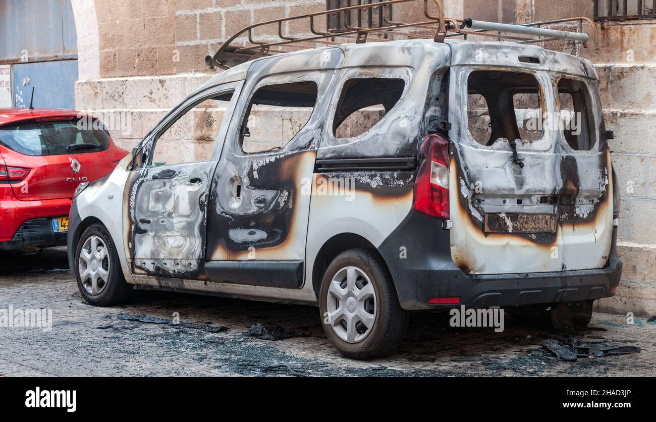 Burned car. the remains of a fire damaged Renault Kangoo a multi ...