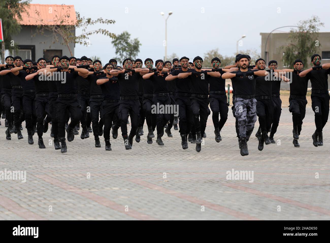 Members of the Palestinian security forces loyal to Hamas, take part in ...