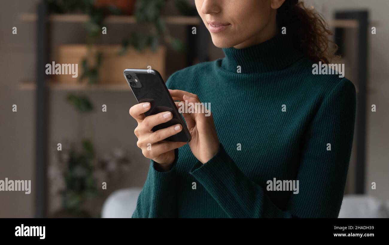 Close up of woman use cellphone browse internet Stock Photo - Alamy