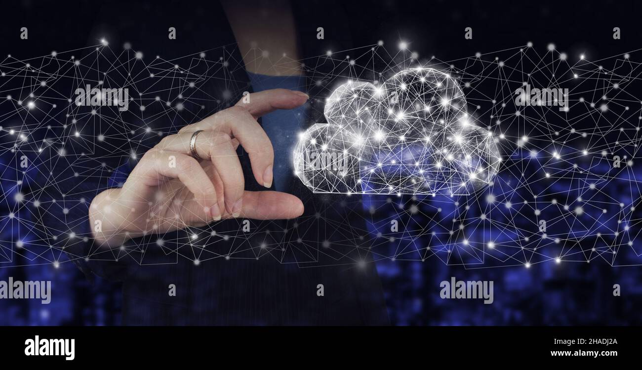 Cloud computing technology internet concept background. Hand hold digital hologram cloud sign on ...