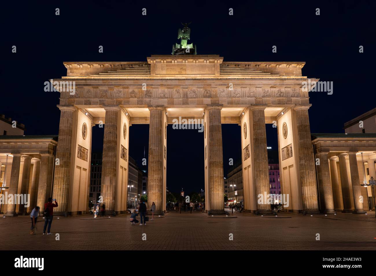 Brandenburg Gate illuminated at night in city of Berlin, Germany ...